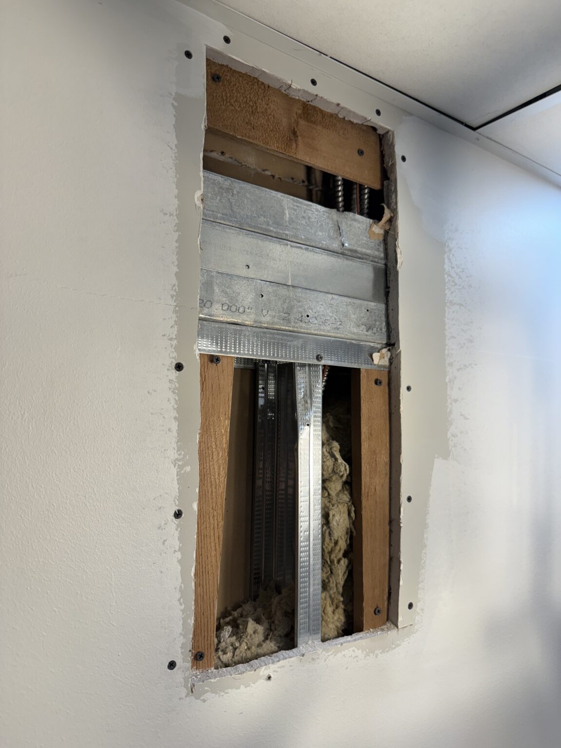 How to Repair Drywall Above a Reception Desk in Vancouver | Microworks